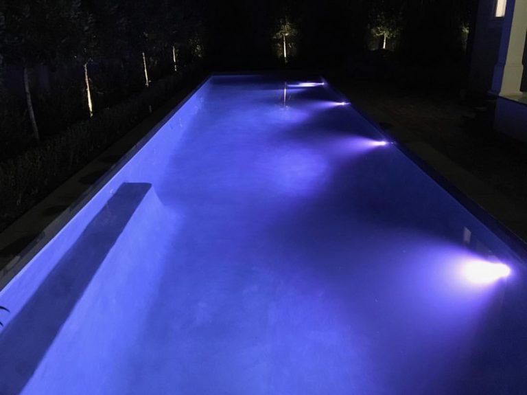Purple color pool lighting - Crystal Pools and Spas